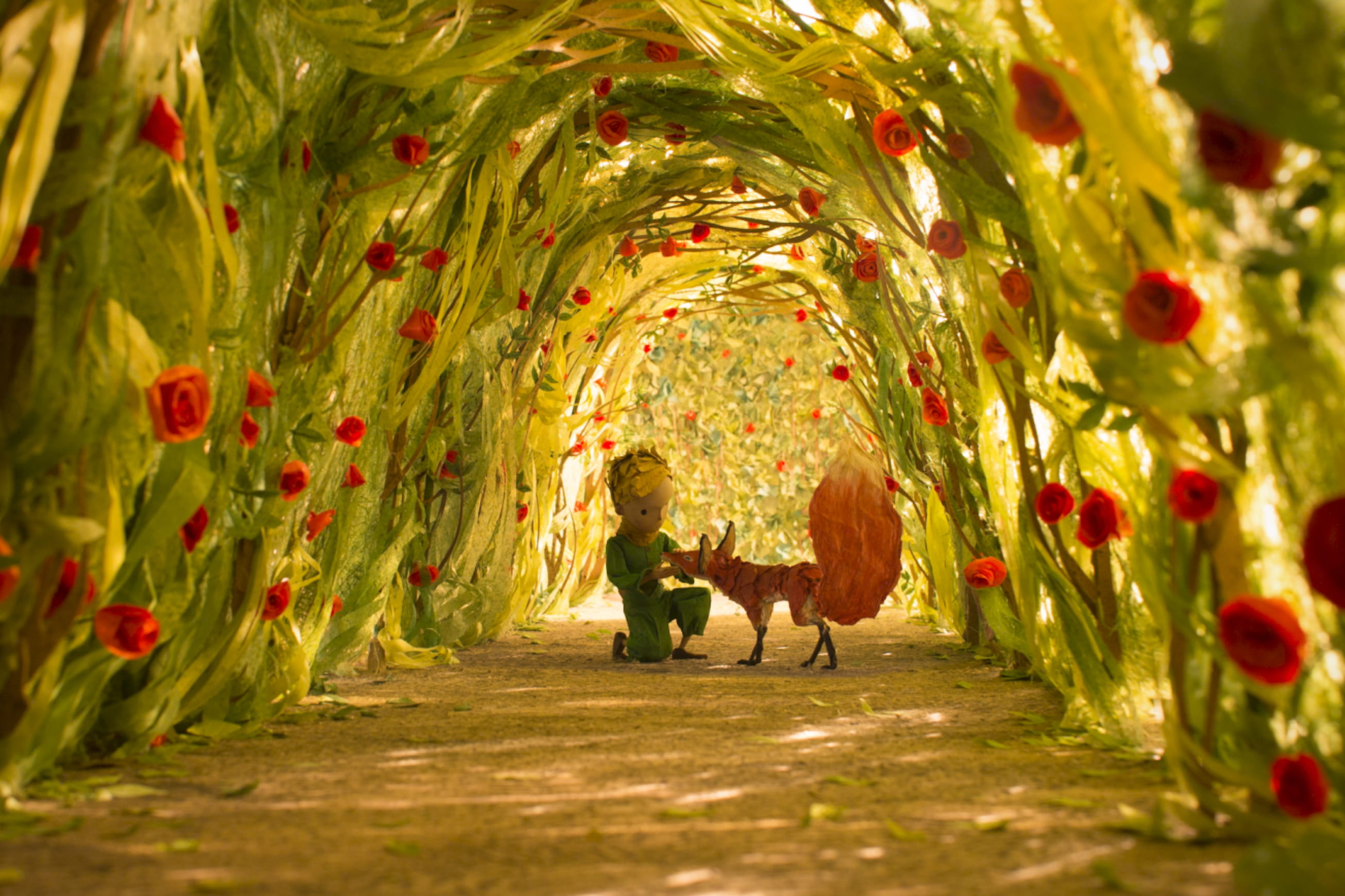Le Petit Prince entouré de roses